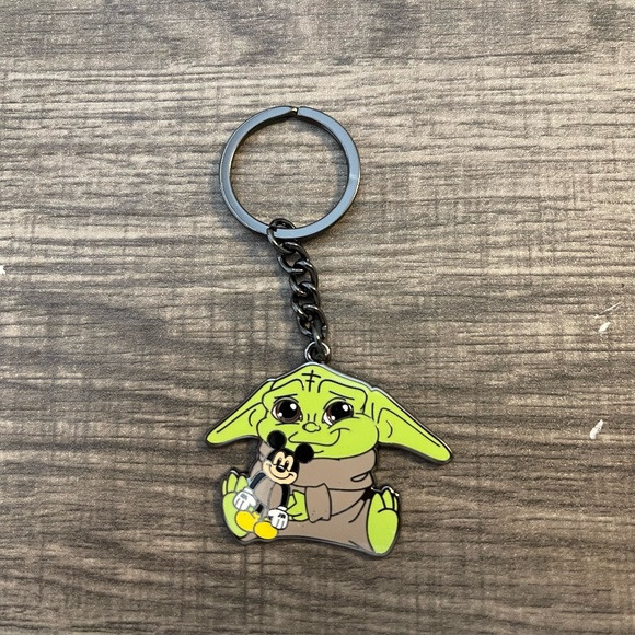BubbleChick | Accessories | The Baby Keychain Baby Yoda Holding Mickey ...